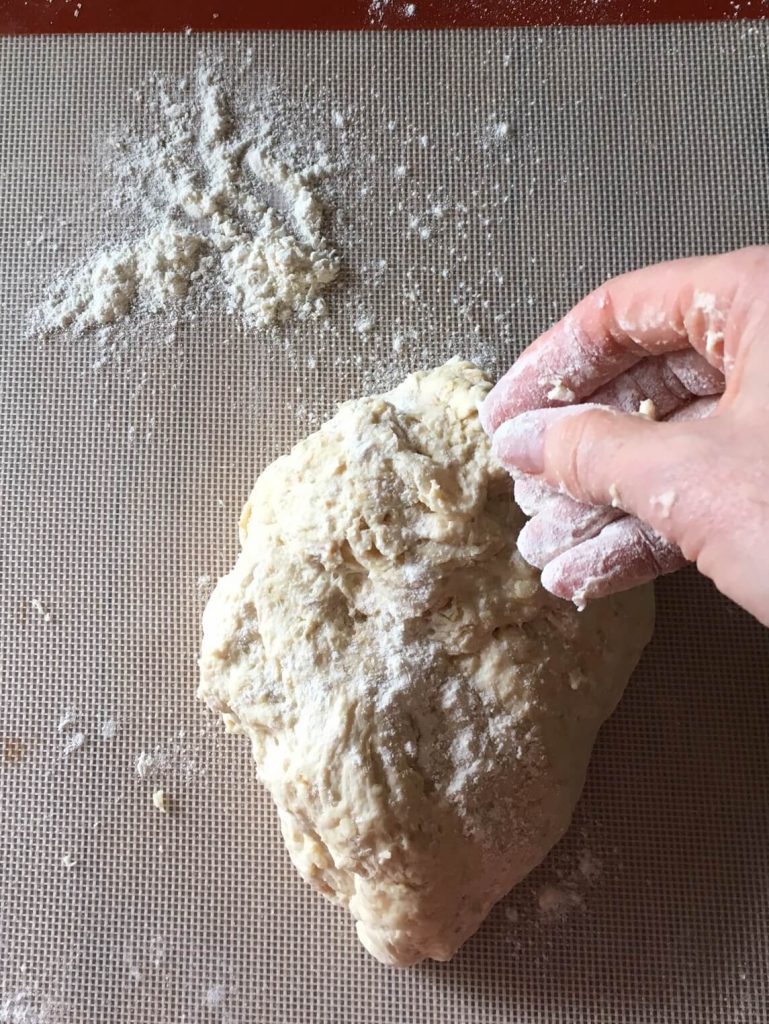 hand-kneading-scrape-dough-onto-floured-work-surface | Priscilla Martel